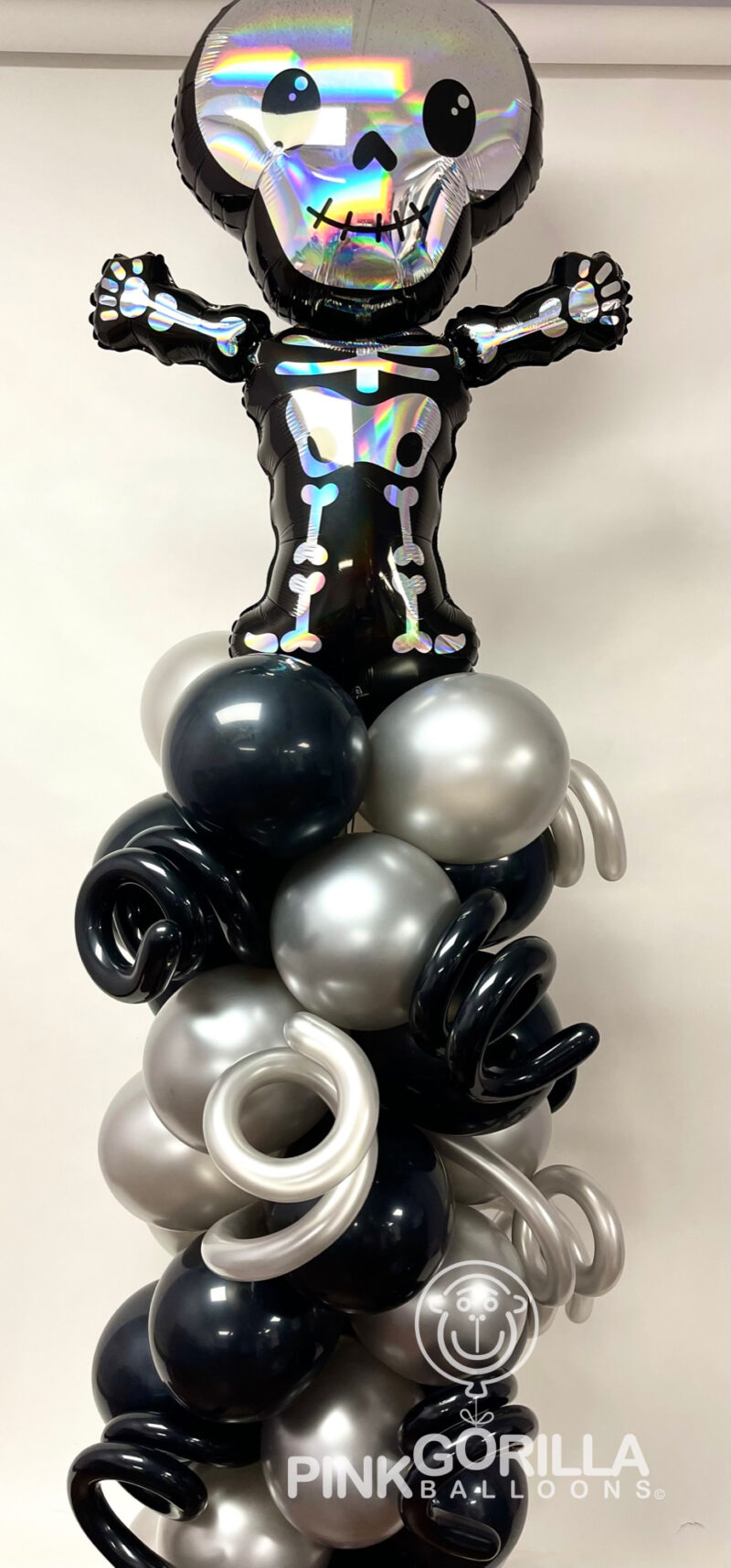 balloon halloween column with skeleton topper - Pink Gorilla Balloons